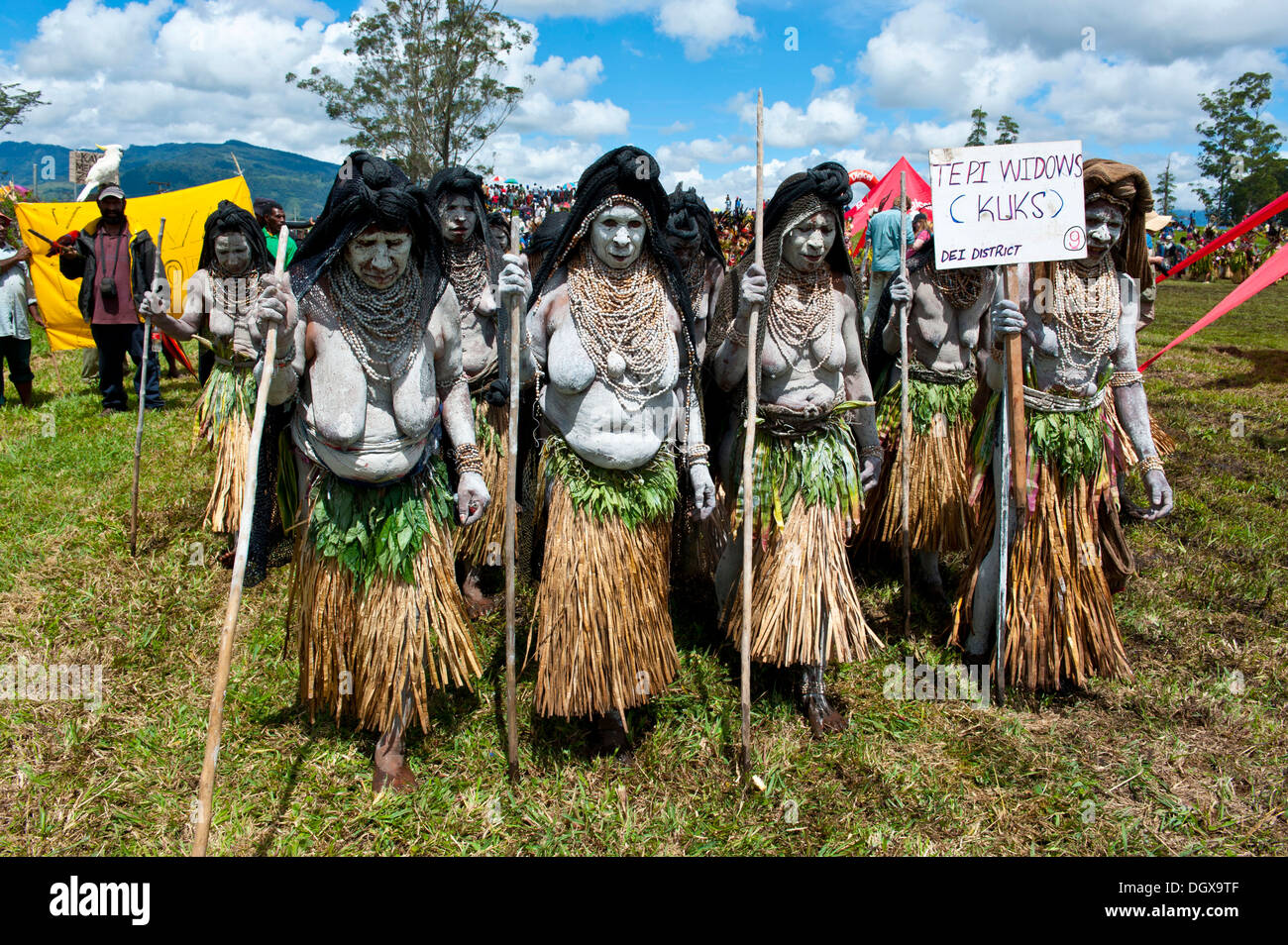 Women in colourfully decorated costumes with face and body paint at the ...