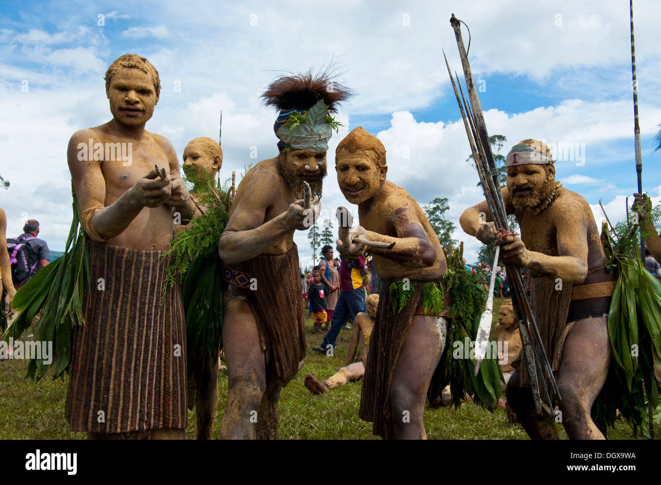 Members of a tribe in colourfully decorated costumes with face and body ...