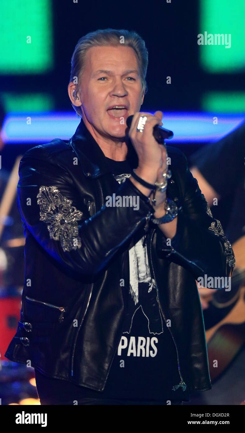 Magdeburg, Germany. 26th Oct, 2013. Irish singer Johnny Logan performs ...