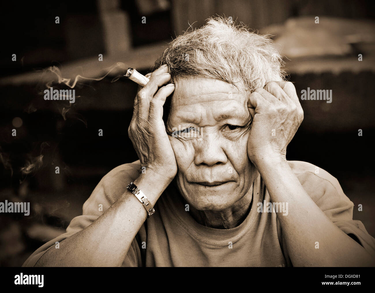 Old man with his head in his hands hi-res stock photography and images ...