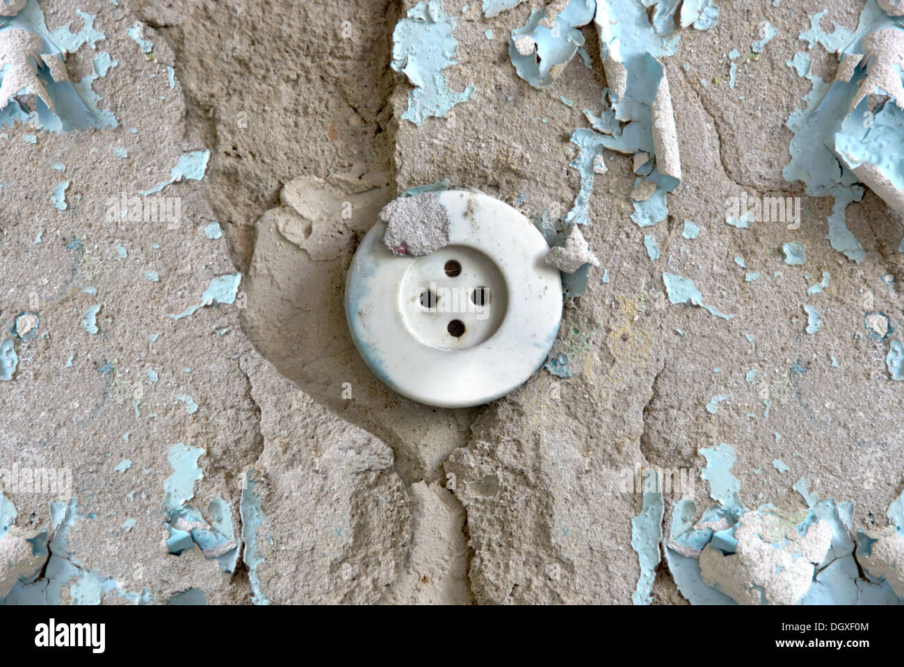 Rough wall with old socket Stock Photo - Alamy