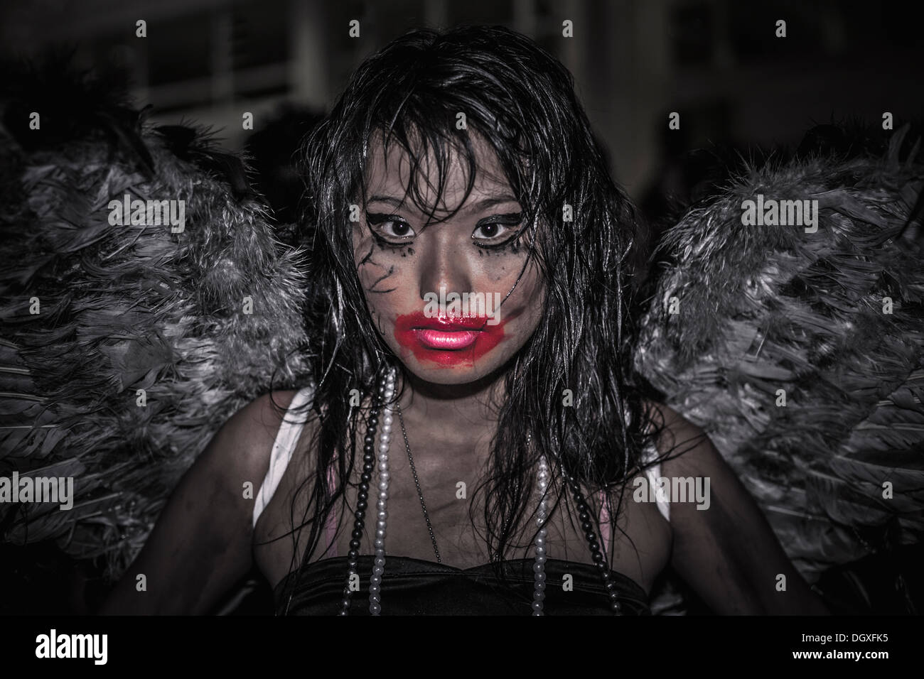 Halloween female vampire dripping blood face make up Stock Photo - Alamy