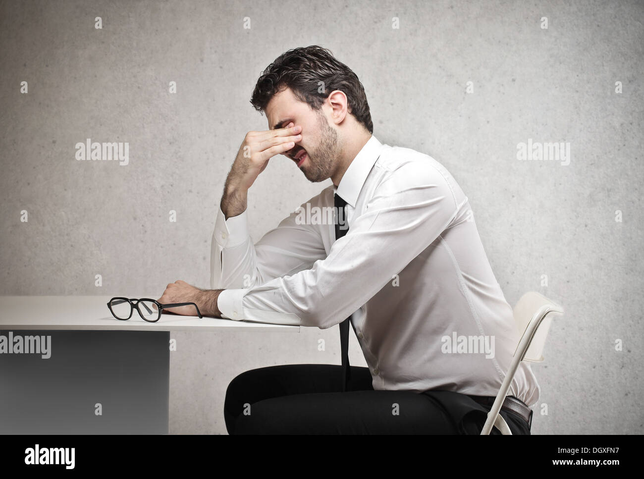 Stressed office worker Stock Photo - Alamy