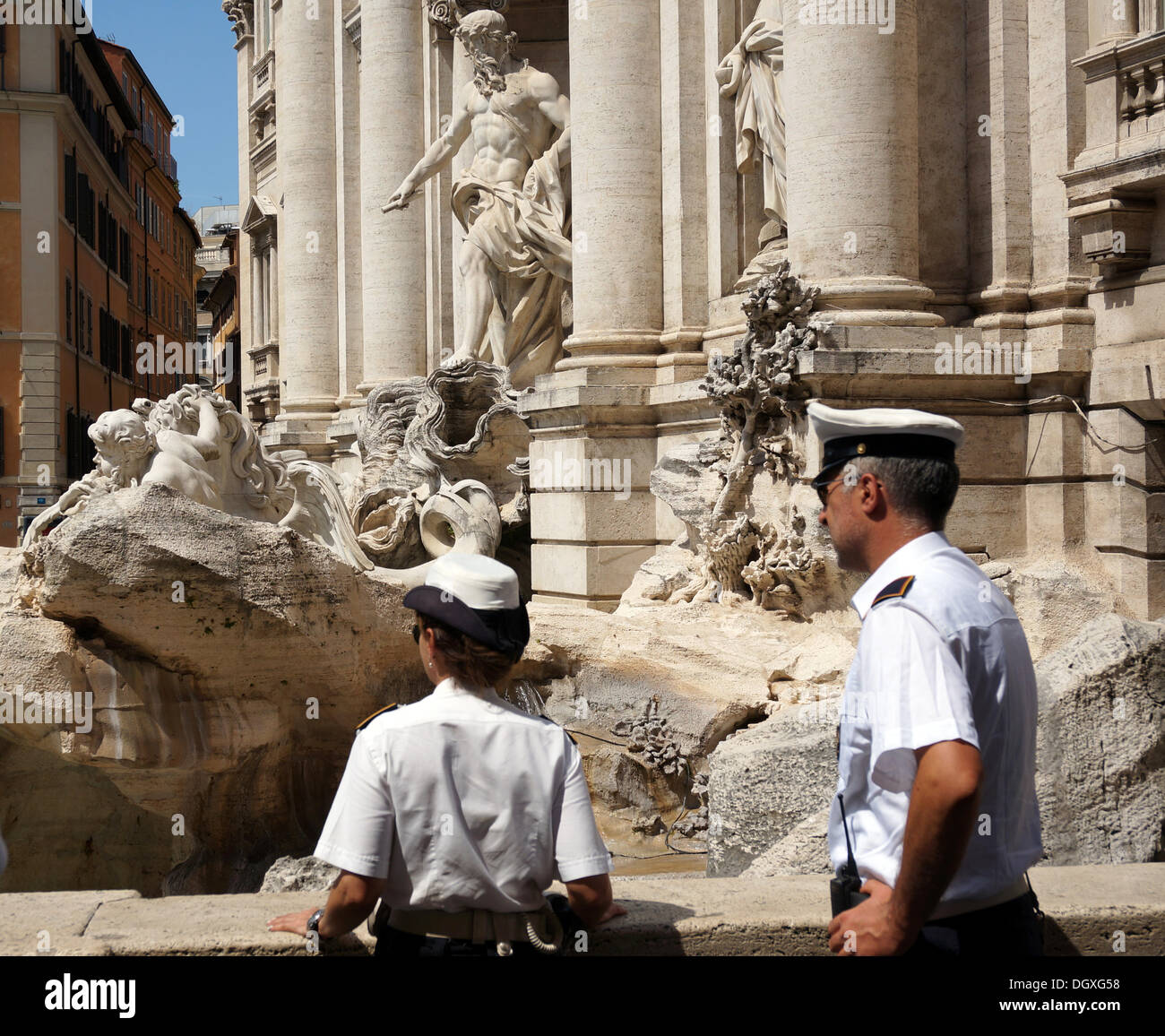 Rome, Italy. 14th Aug, 2013. Police officers watch the people at the ...