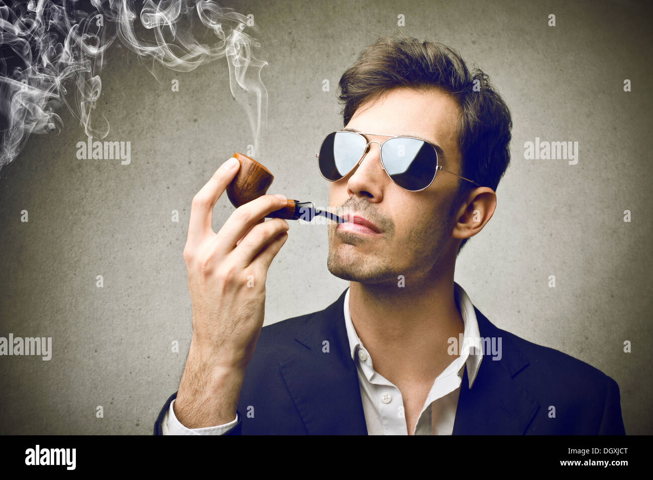 Vintage man smoking a pipe hi-res stock photography and images - Alamy