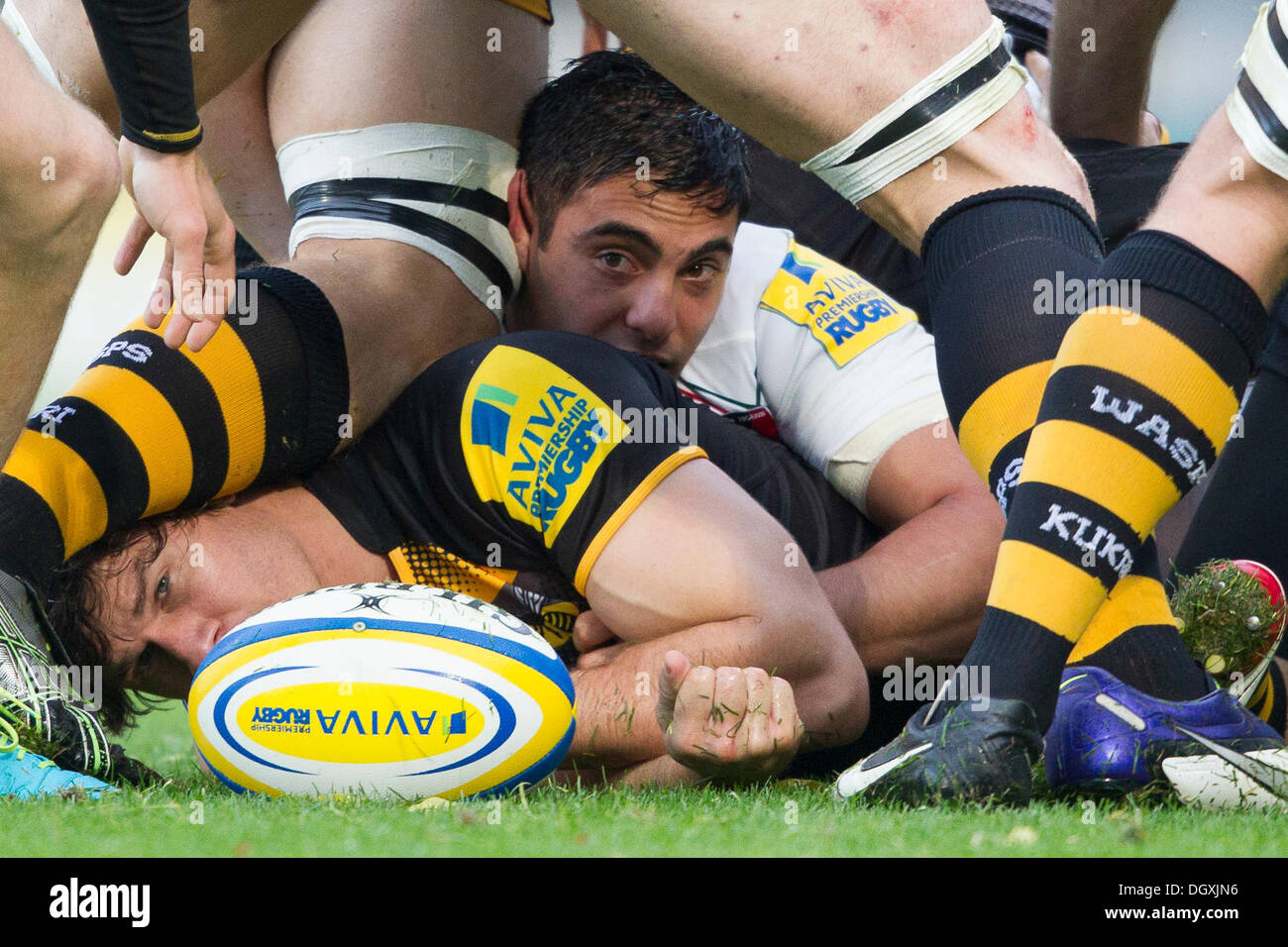 High Wycombe, GB - Dan Bowden peeks out from the bottom of a ruck ...