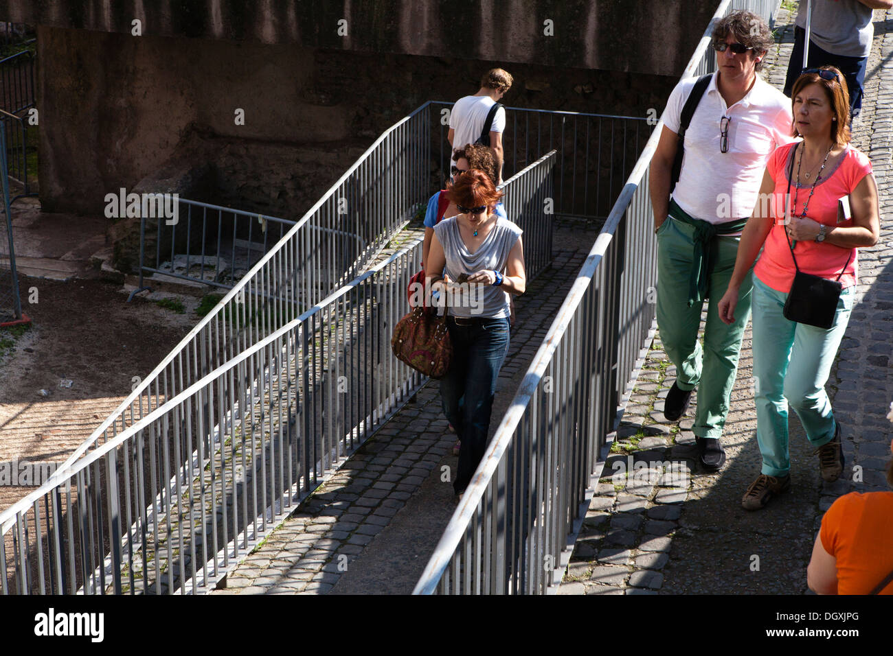 Tourists in Rome walking down ramp Stock Photo - Alamy
