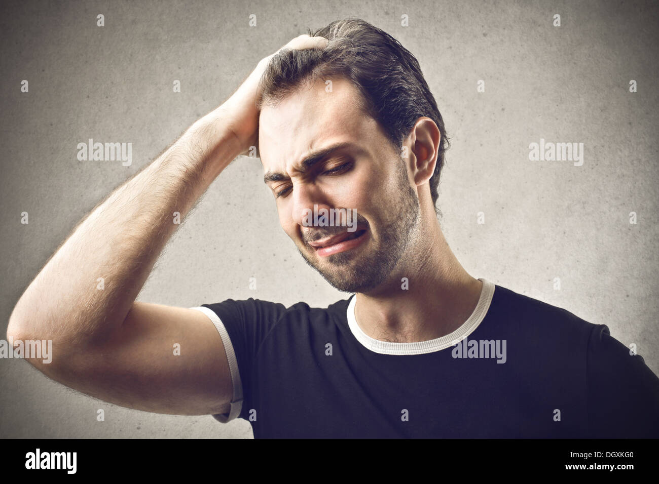 Portrait of a despairing boy Stock Photo - Alamy