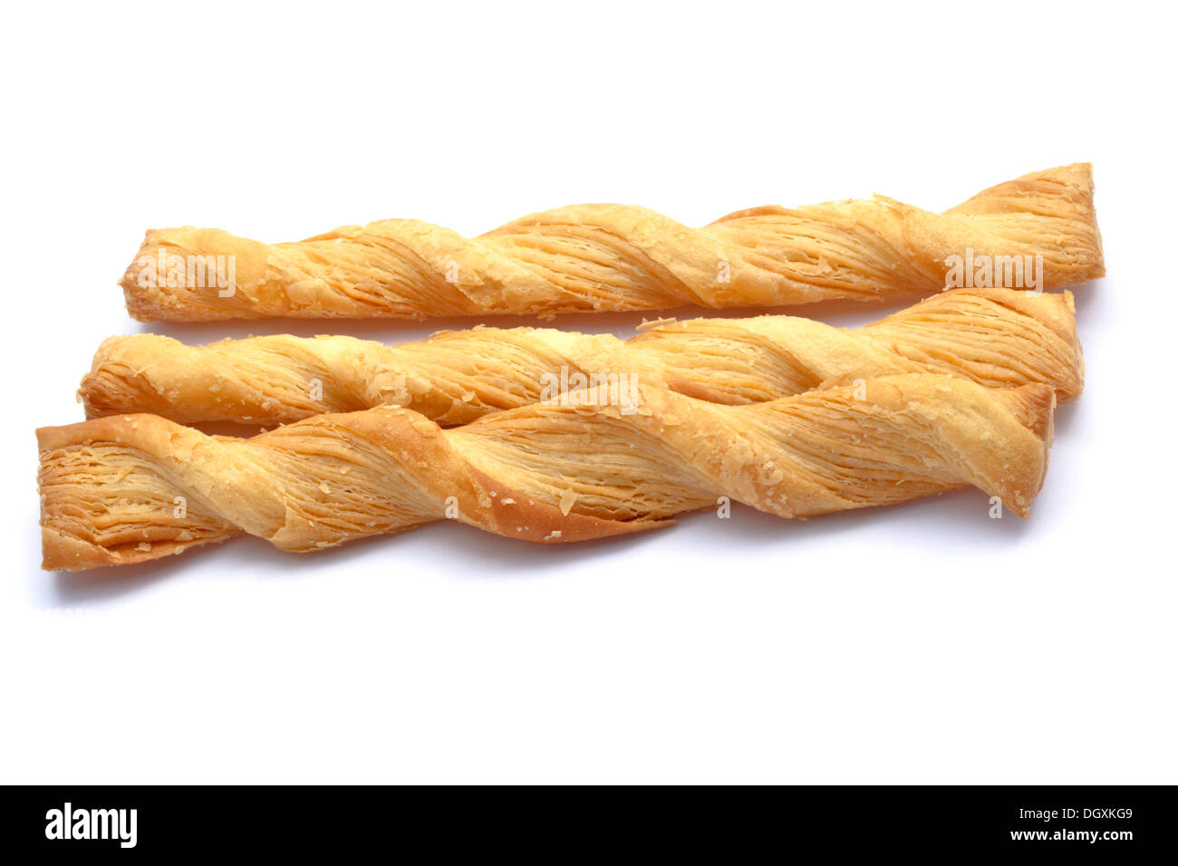 Butter salted twists closeup on white background Stock Photo - Alamy