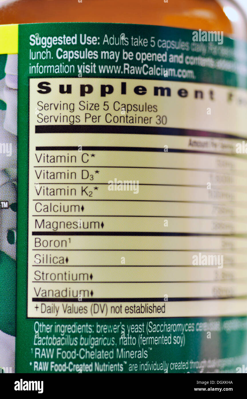 Supplement facts on calcium pills container Stock Photo - Alamy