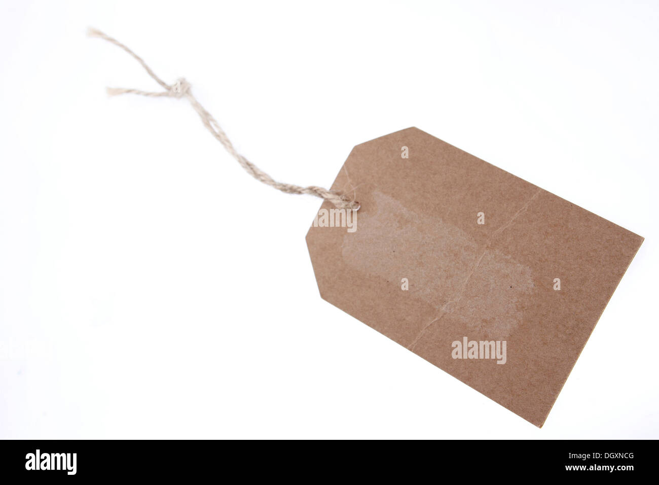 Blank price tag and string on plain background Stock Photo - Alamy