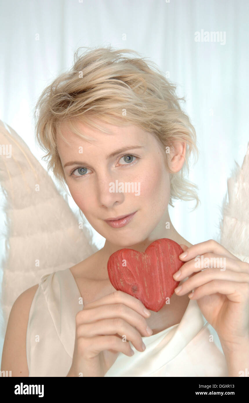 Woman angel costume hi-res stock photography and images - Alamy