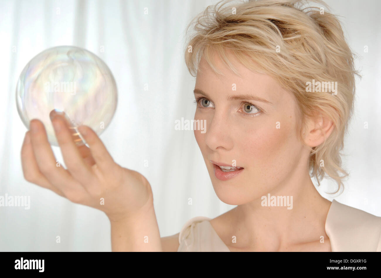 Sphere holding hi-res stock photography and images - Alamy