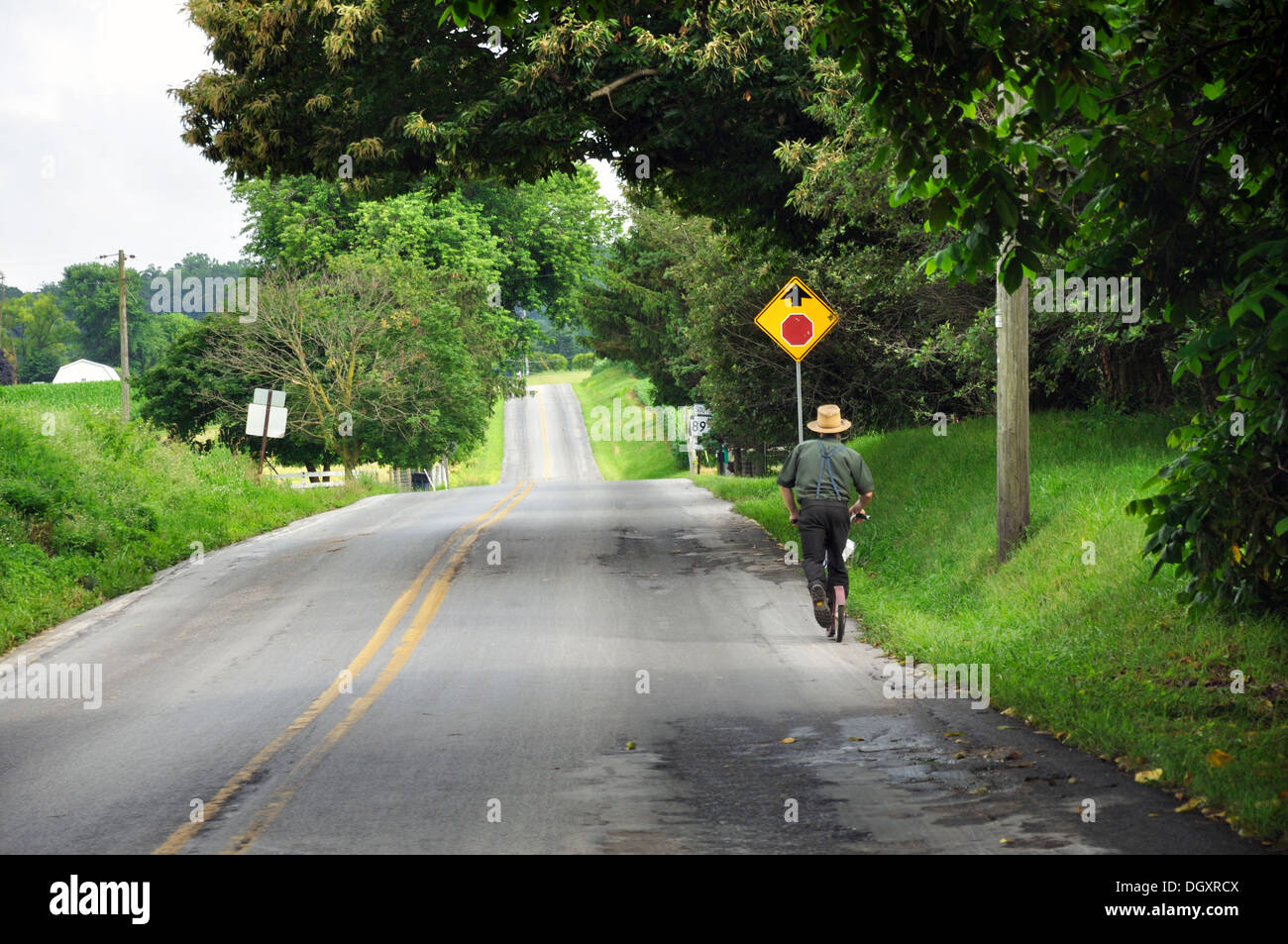 Amish riding scooter hi-res stock photography and images - Alamy