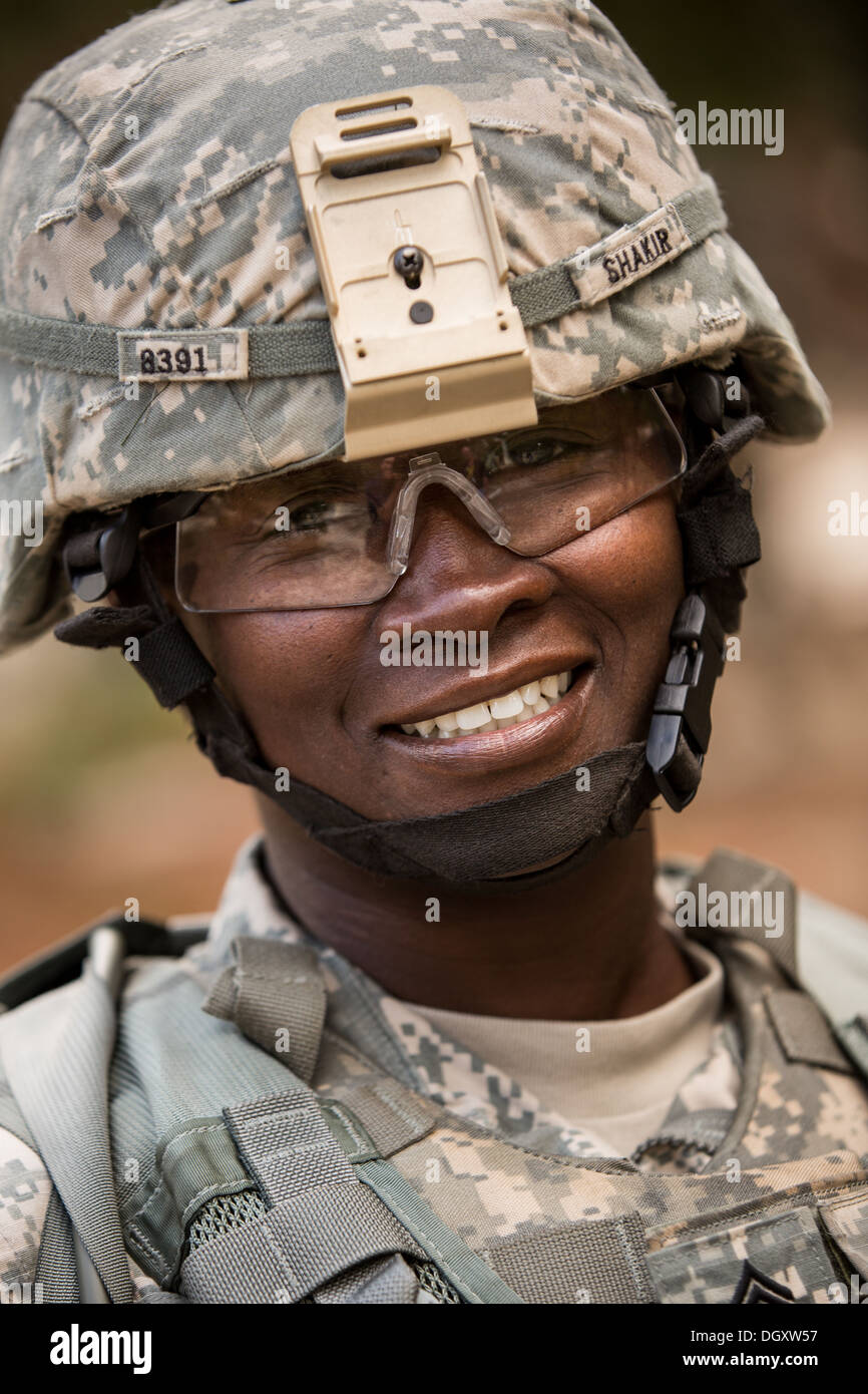 A Woman Drill Sergeant Smiles As She Observes Her Recruits During Basic