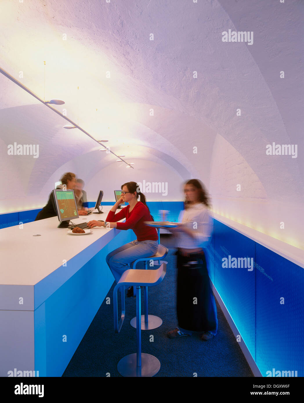 Futuristic Internet cafe with people Stock Photo - Alamy