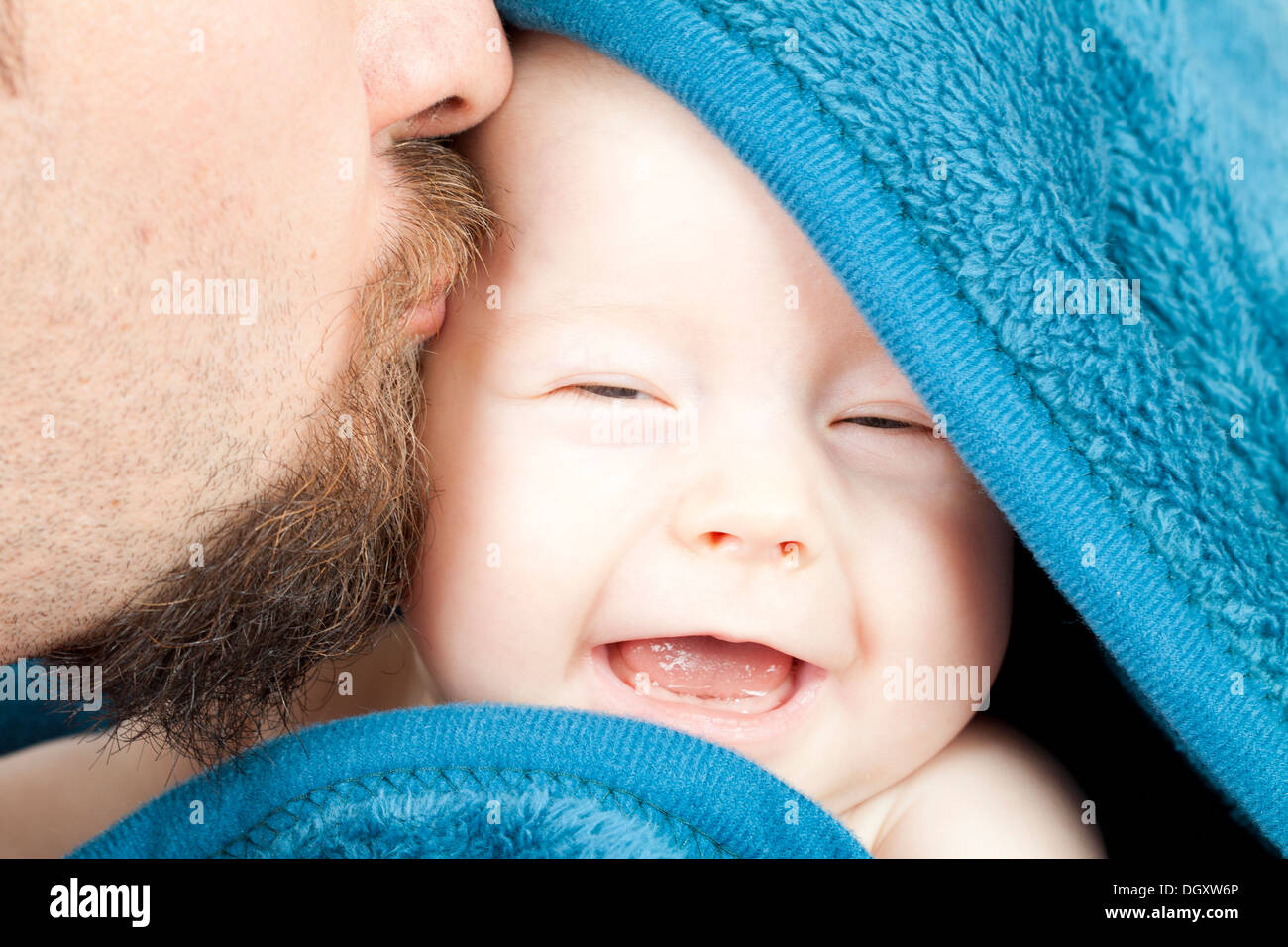 Father kissing his smiling baby girl Stock Photo - Alamy