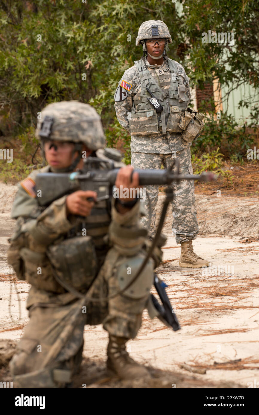 A Woman Drill Sergeant Observes Her Recruits During Basic Combat