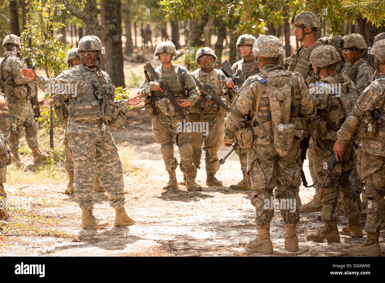 A woman Drill Sergeant instructs her recruits during basic combat ...