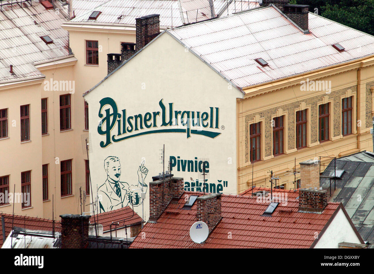 Advertisement for the beer Pilsner Urquell at a house facade in Pilsen ...