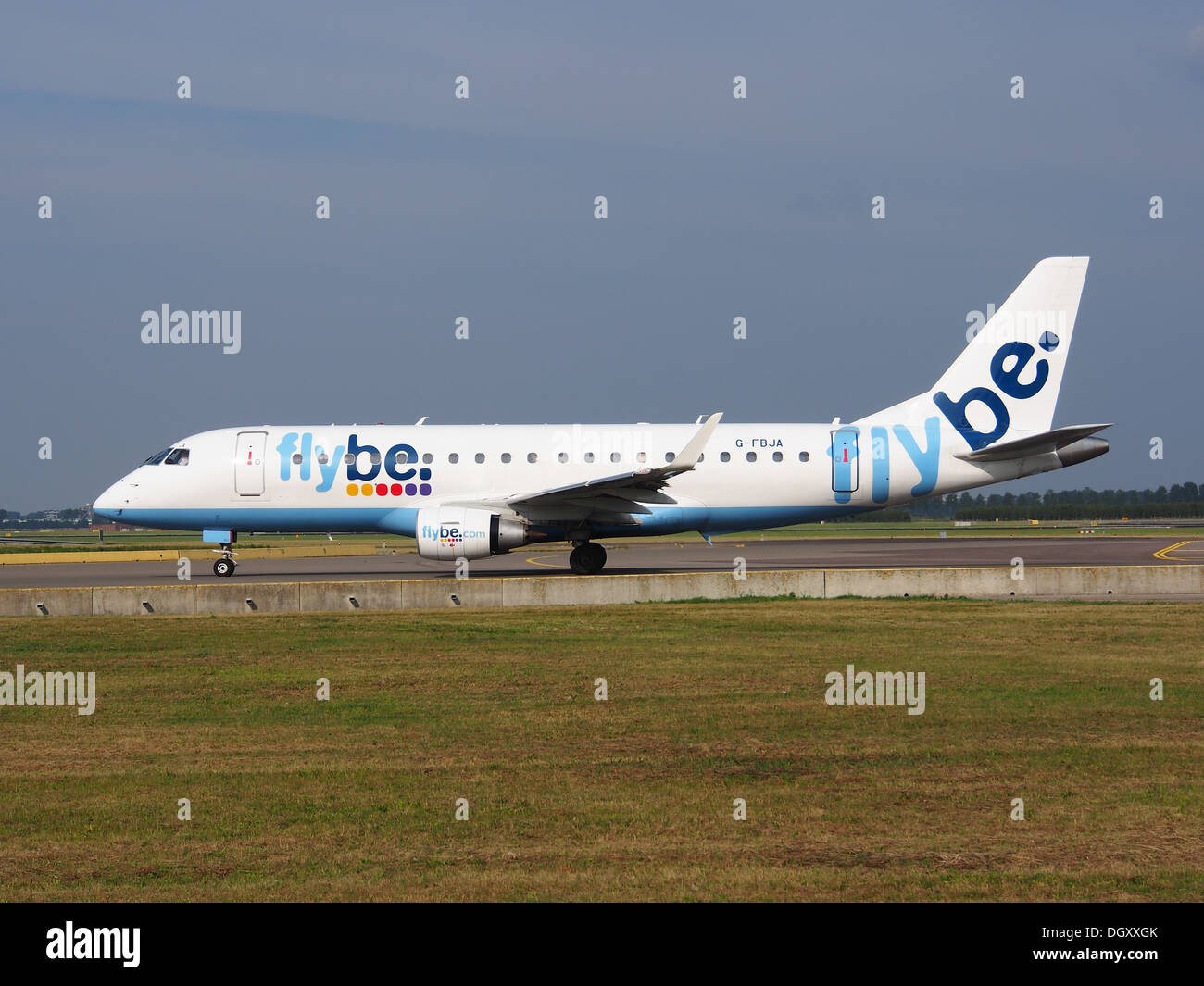 The G-FBJA Flybe Embraer ERJ-175STD, a regional jet, taxis at Schiphol ...