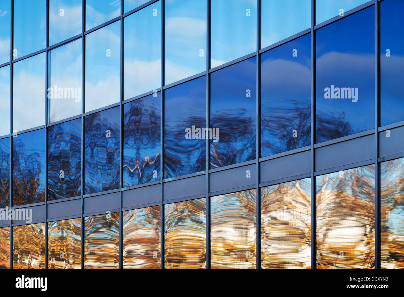 Modern metal and glass wall with bright colorful reflections Stock ...