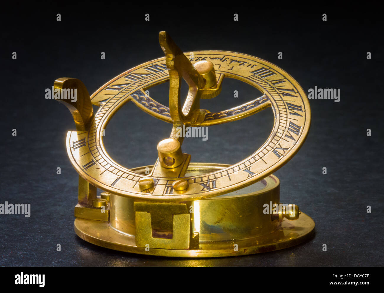 Old copper sextant and compass Stock Photo - Alamy