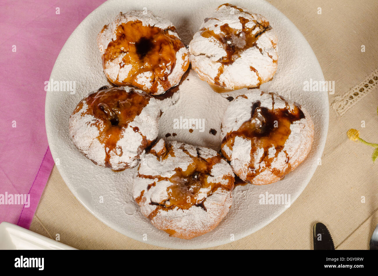 Sweet stuffed sufganihot, a classic Hanukkah snack Stock Photo - Alamy