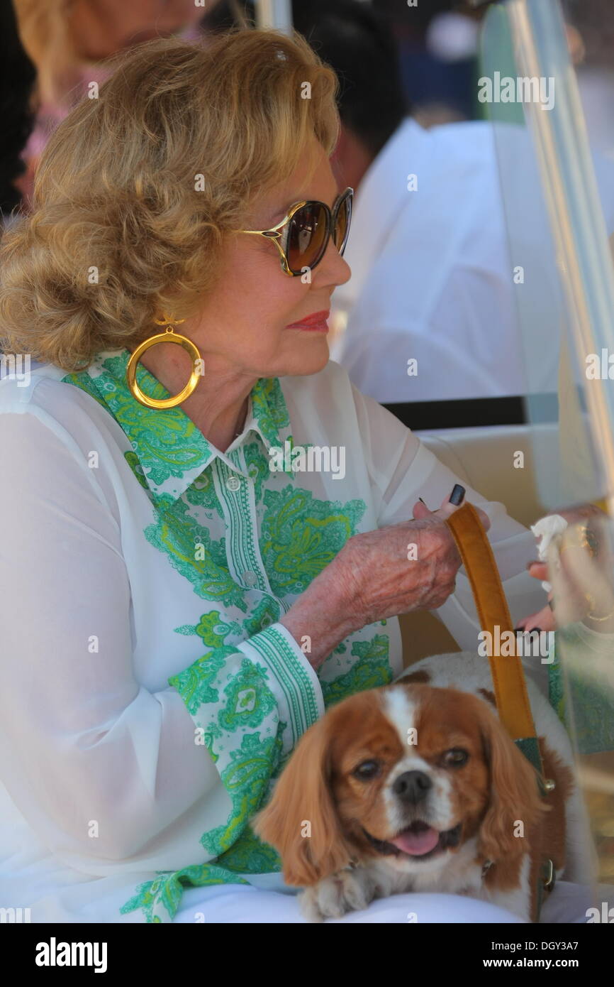 BARBARA SINATRA plays hostess to the iconic Palm Desert golf cart ...