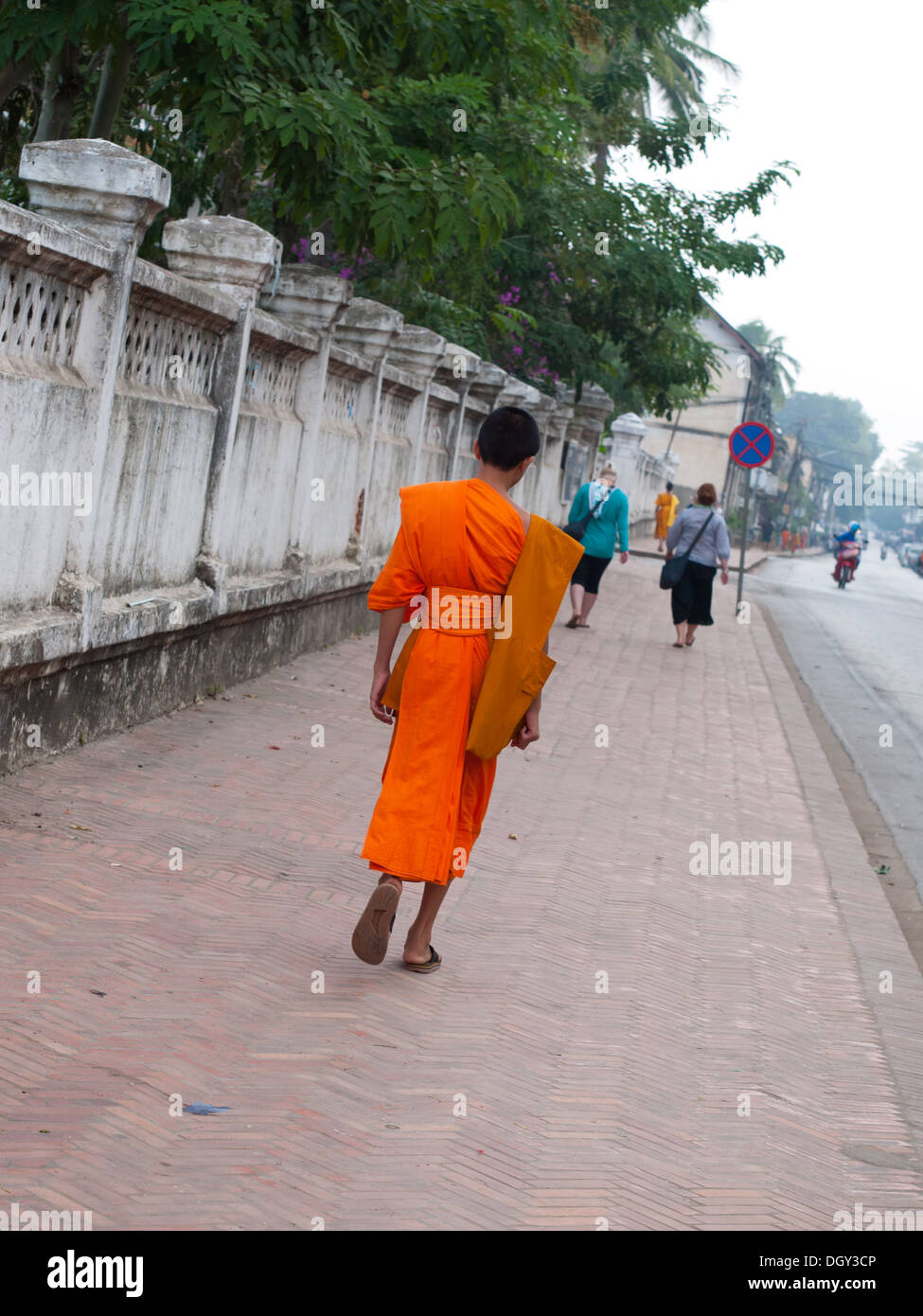 Buddhist monk walks hi-res stock photography and images - Alamy