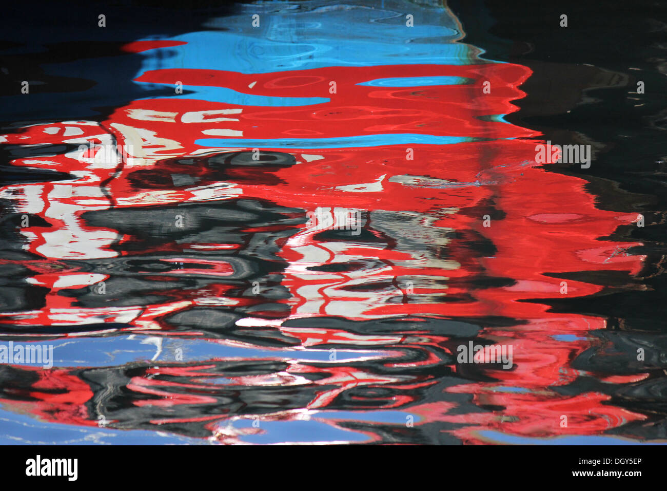 Abstract, reflected colors with red being dominant Stock Photo - Alamy