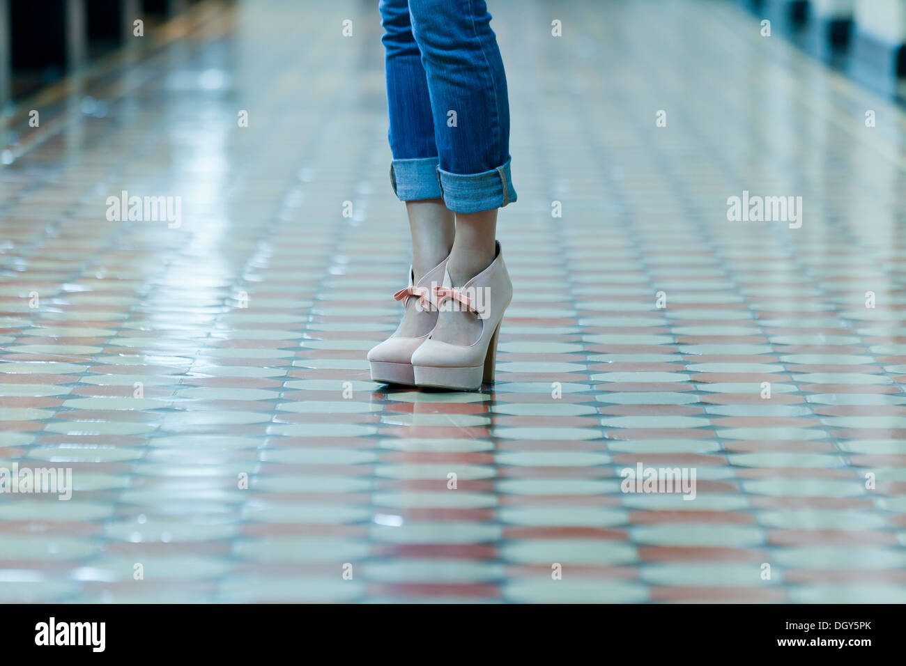Woman tile hi-res stock photography and images - Alamy