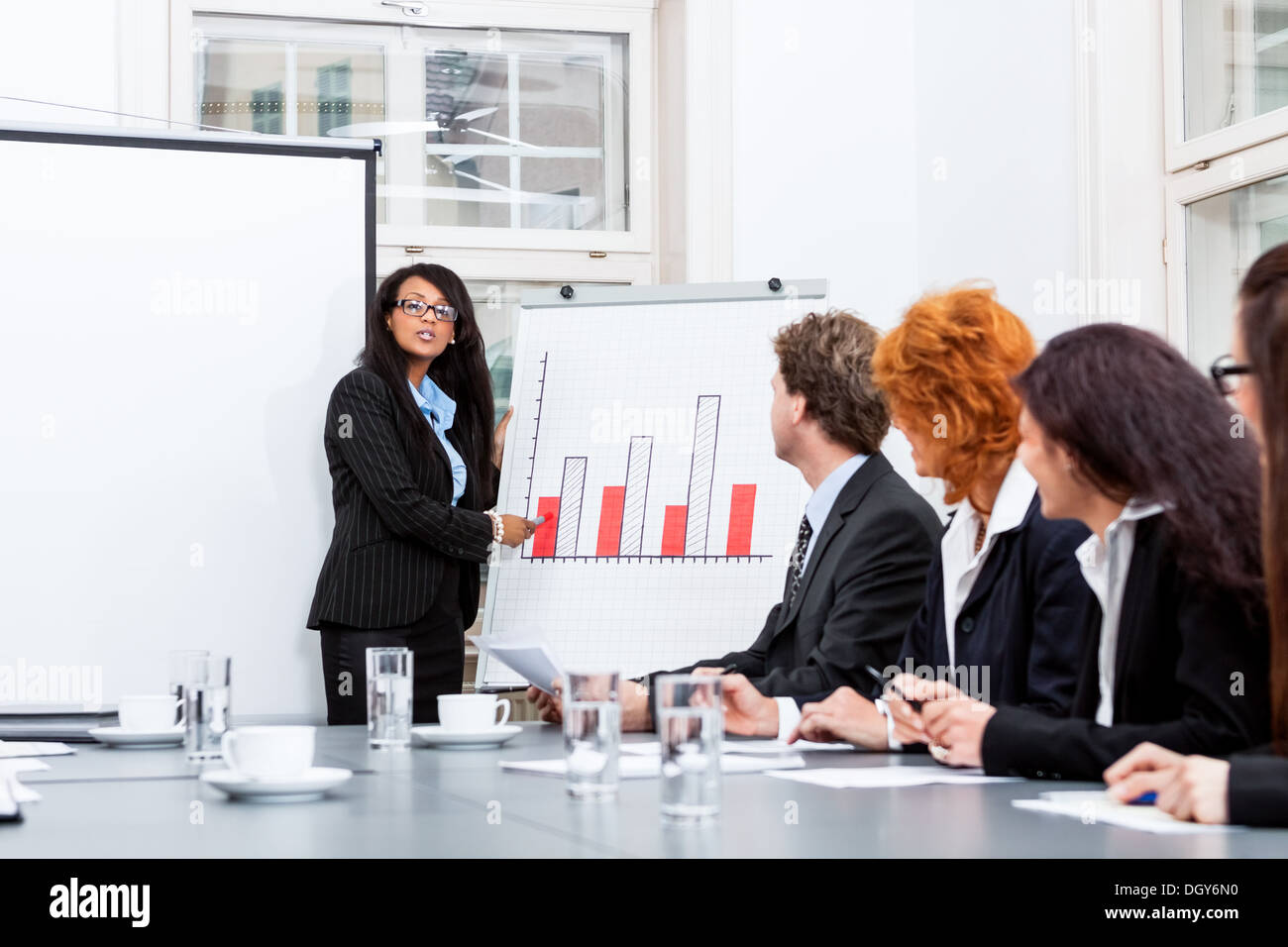 business team on table in office conference seminar presentation Stock ...