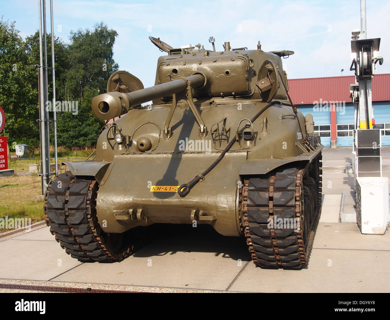 A Sherman M4 tank (serial number 30126965) is displayed as part of a ...