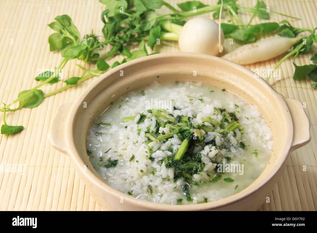 Rice porridge with seven different kinds of spring herbs Stock Photo ...