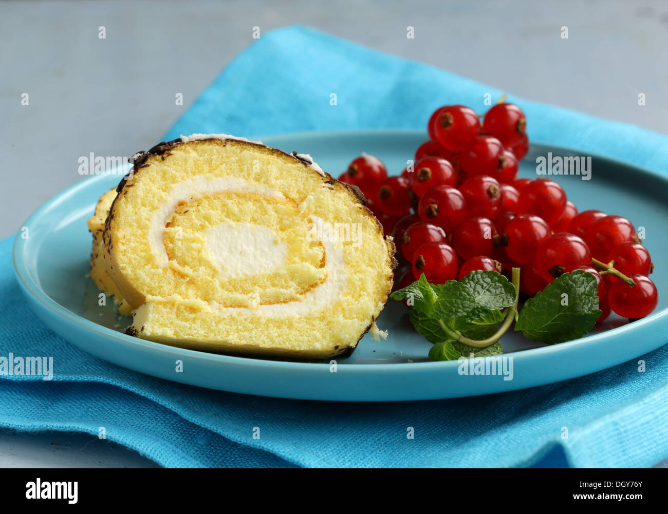 vanilla roll cake with chocolate ganache and creamy cream Stock Photo ...