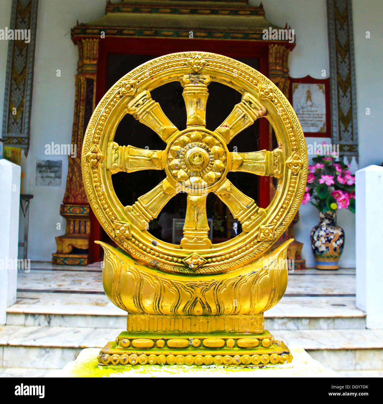 Gold Thammachak Symbol of Buddhism Stock Photo - Alamy
