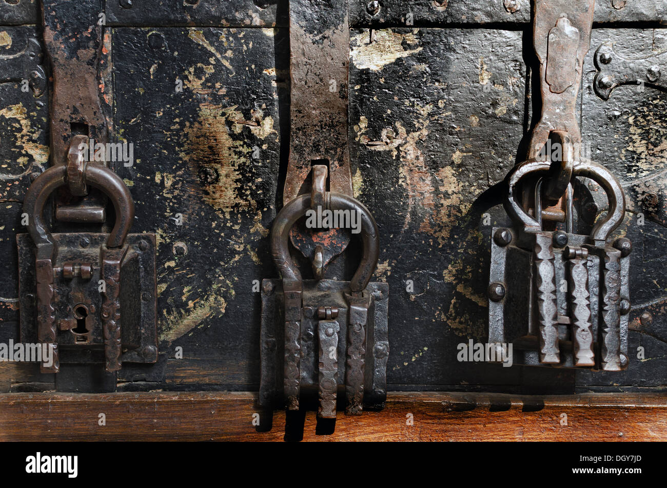 Three ancient padlocks in an iron chest Stock Photo - Alamy