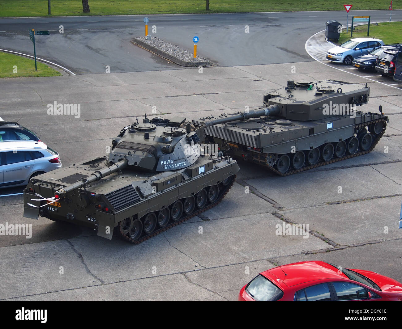 The Leopard 2A4, a modern German main battle tank, is shown towing the ...