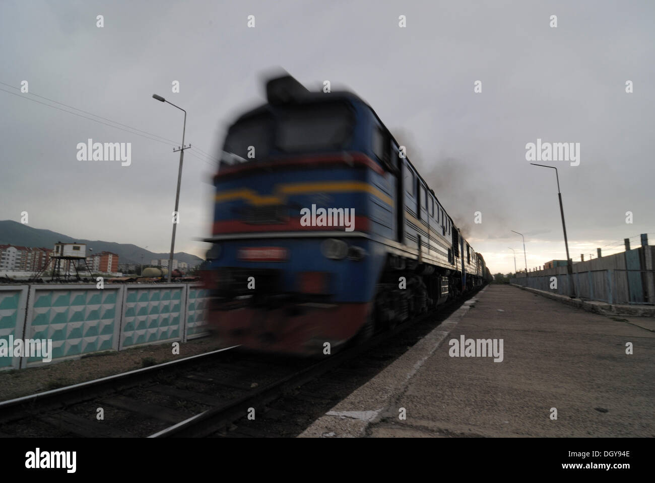 Diesel locomotive pulling a freight train of the Transmongolian Railway ...