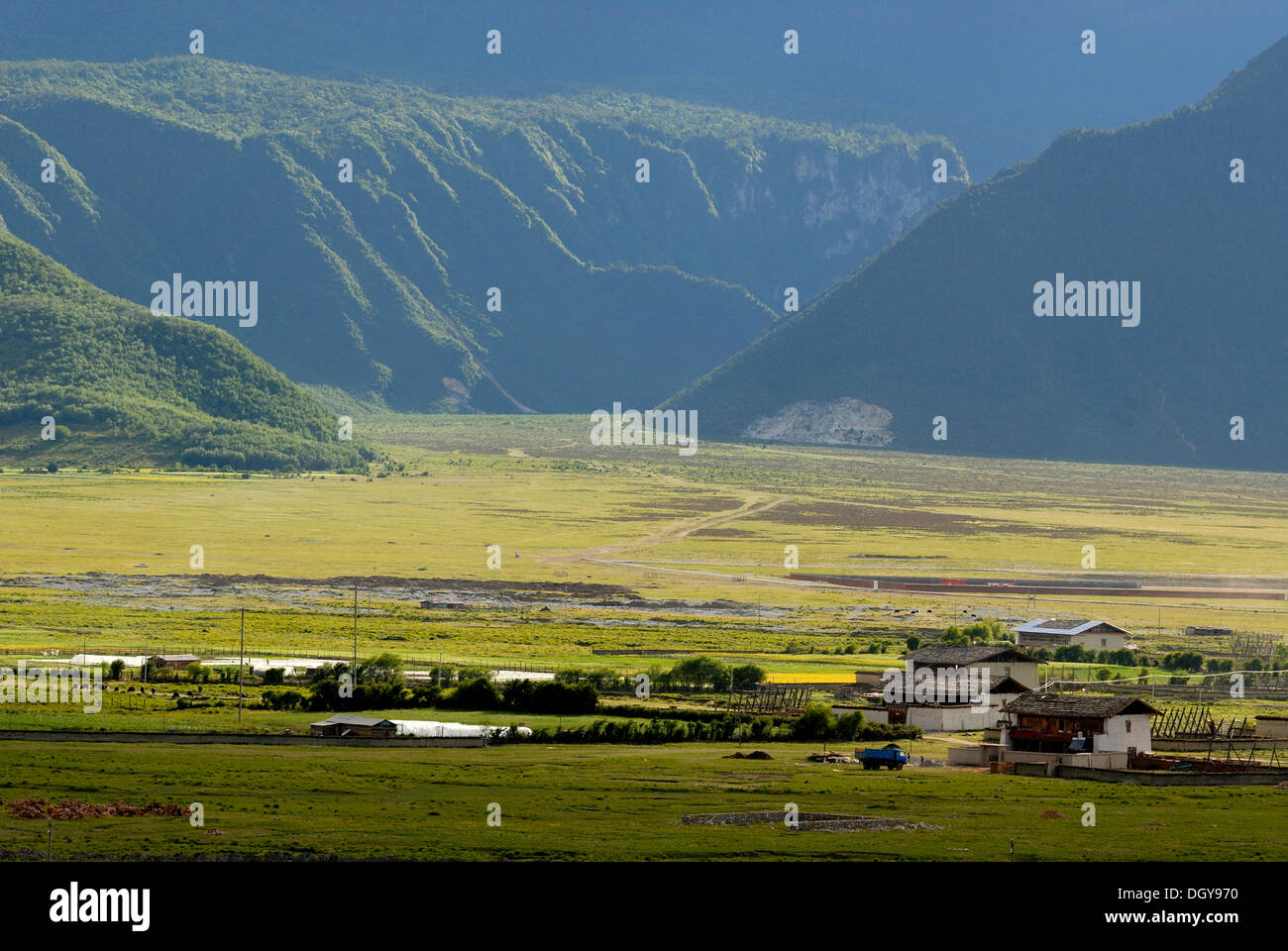 Tibetan farm houses in the Himalayan foothills, village in Eastern ...