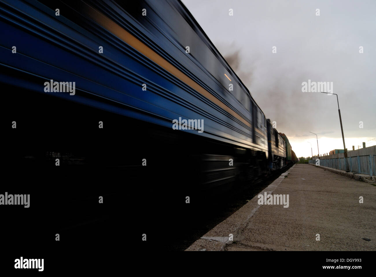 Diesel locomotive pulling a freight train of the Transmongolian railway ...