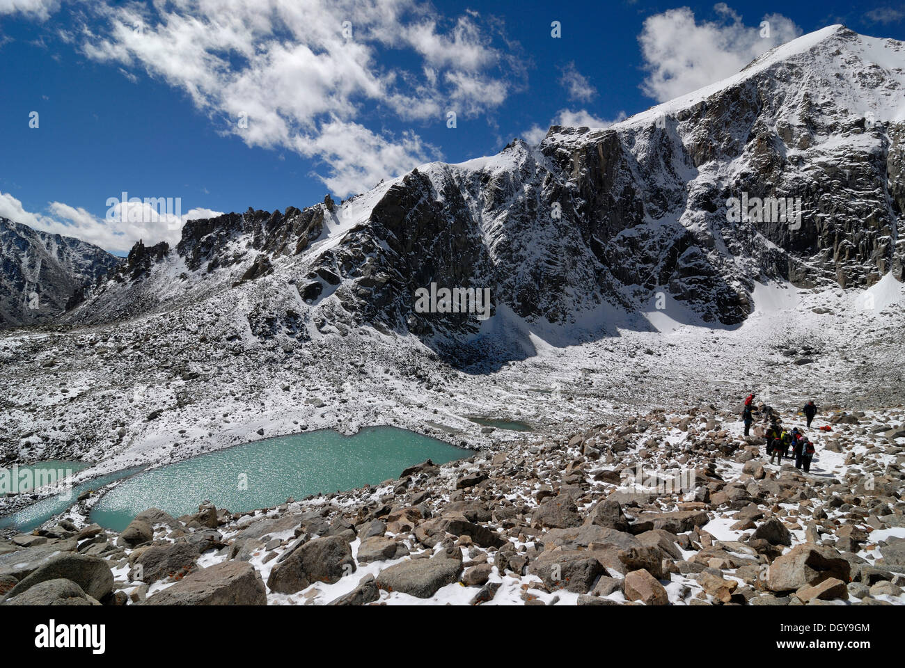 Sacred lake in the snow at the peak of Mt Dolma La Pass, 5700m, on a ...