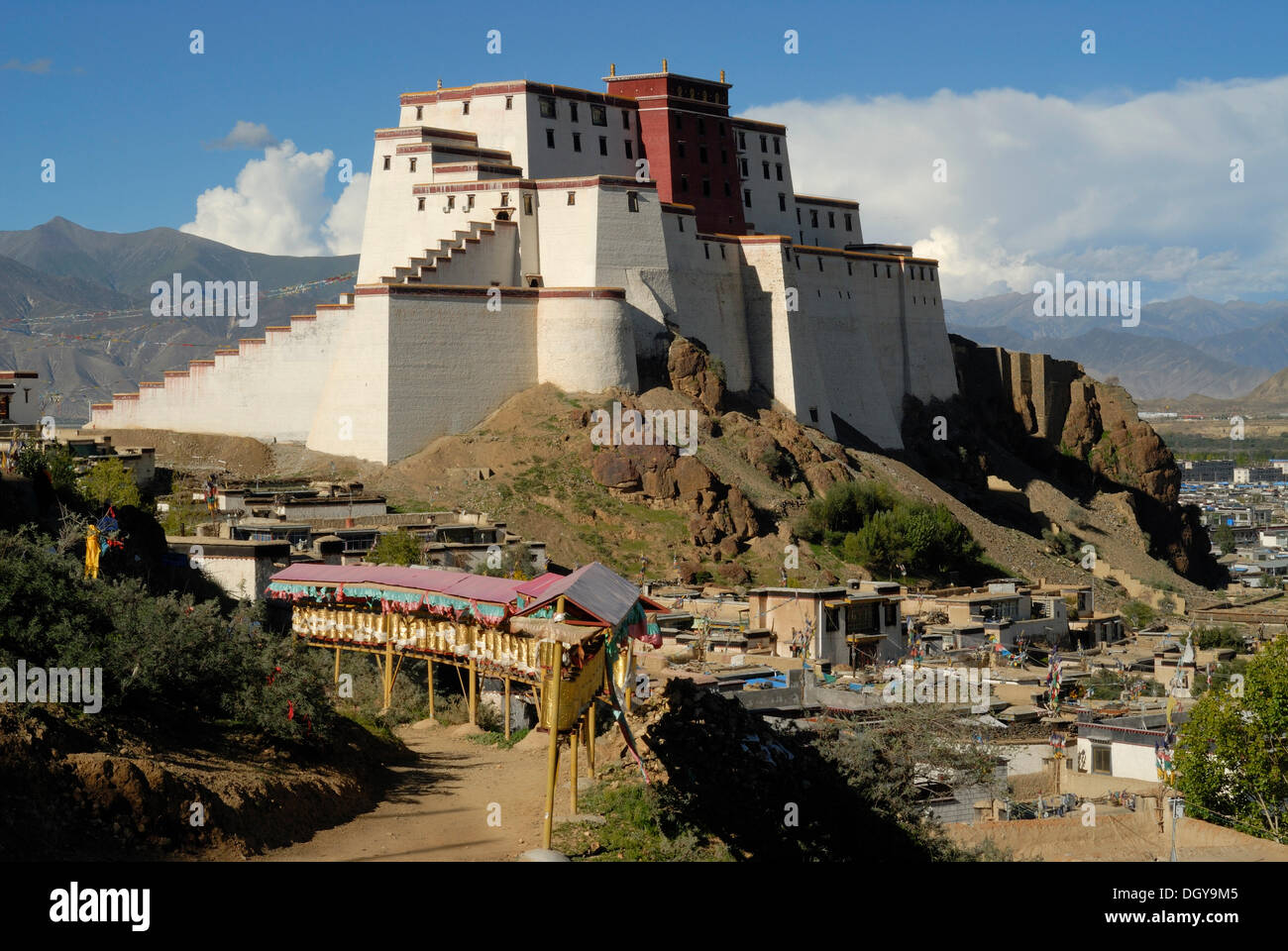 Rebuilt Shigatse Dzong fortress, with Tibetan old town of Shigatse ...