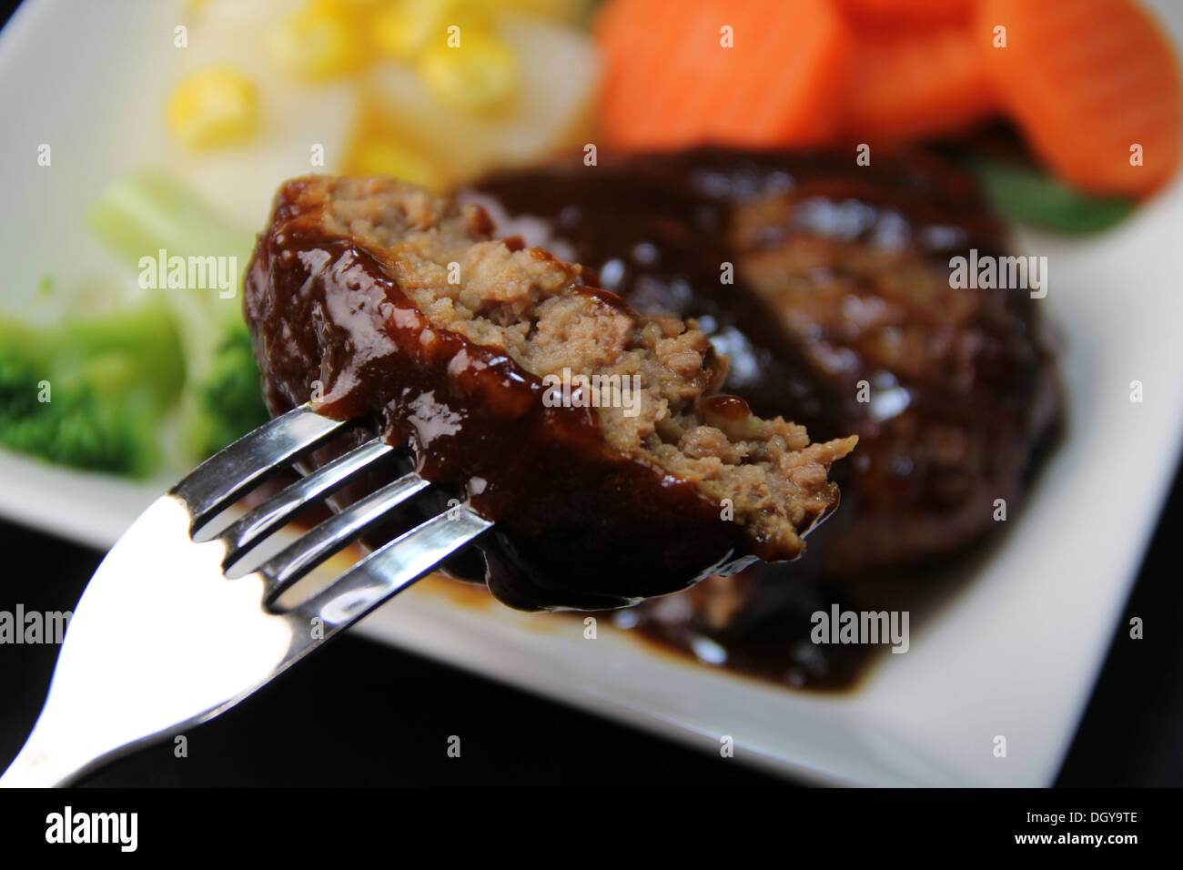 Plate of hamburger steak Stock Photo - Alamy