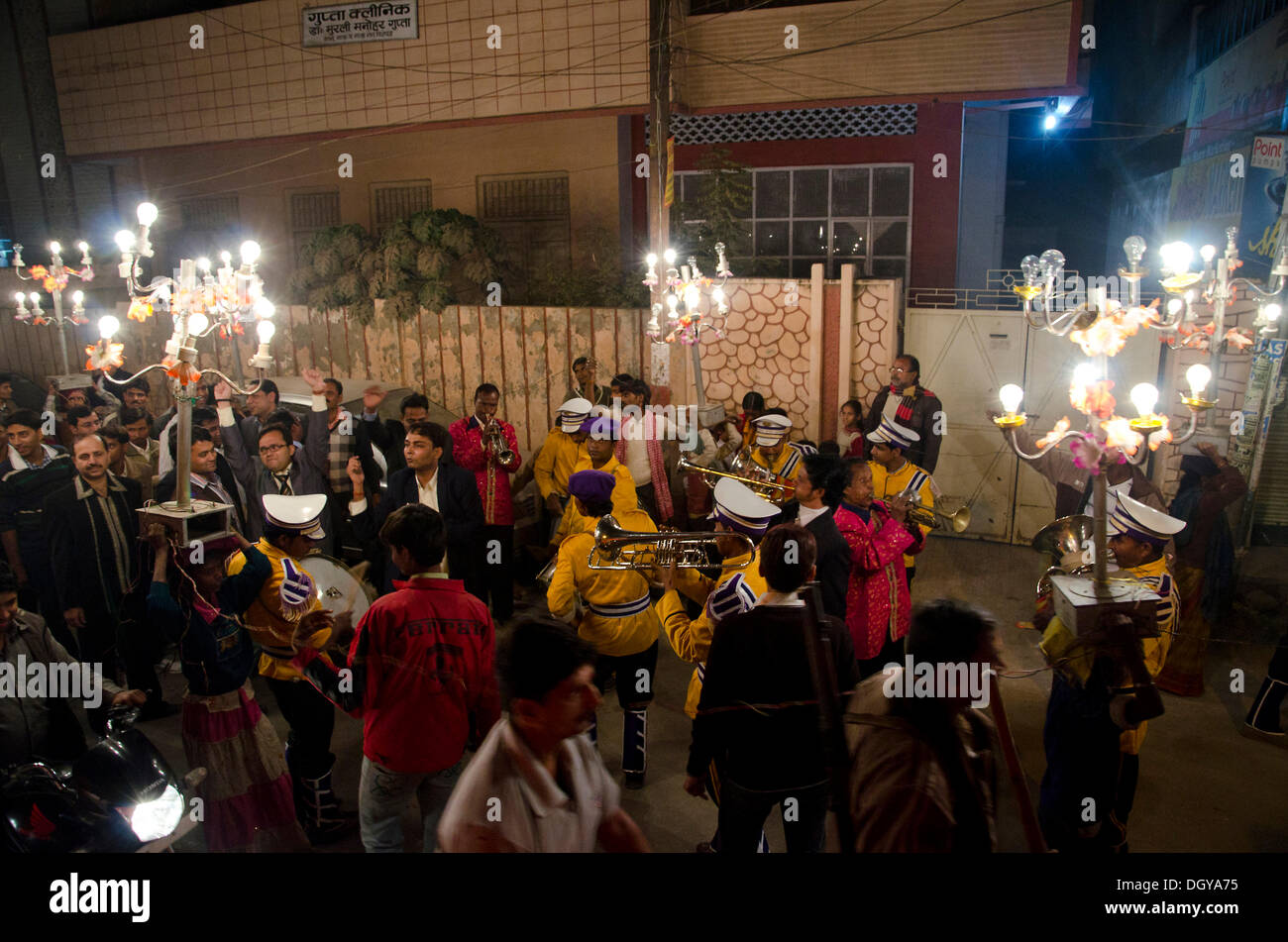 Wedding procession with lamp chandeliers and trumpeters at night ...