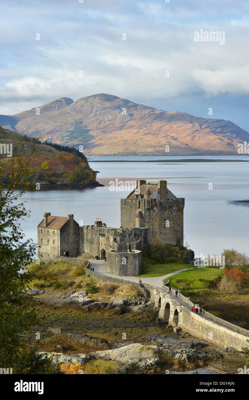 Eilean Donan Castle with autumnal forest, headquarters of the Scottish ...