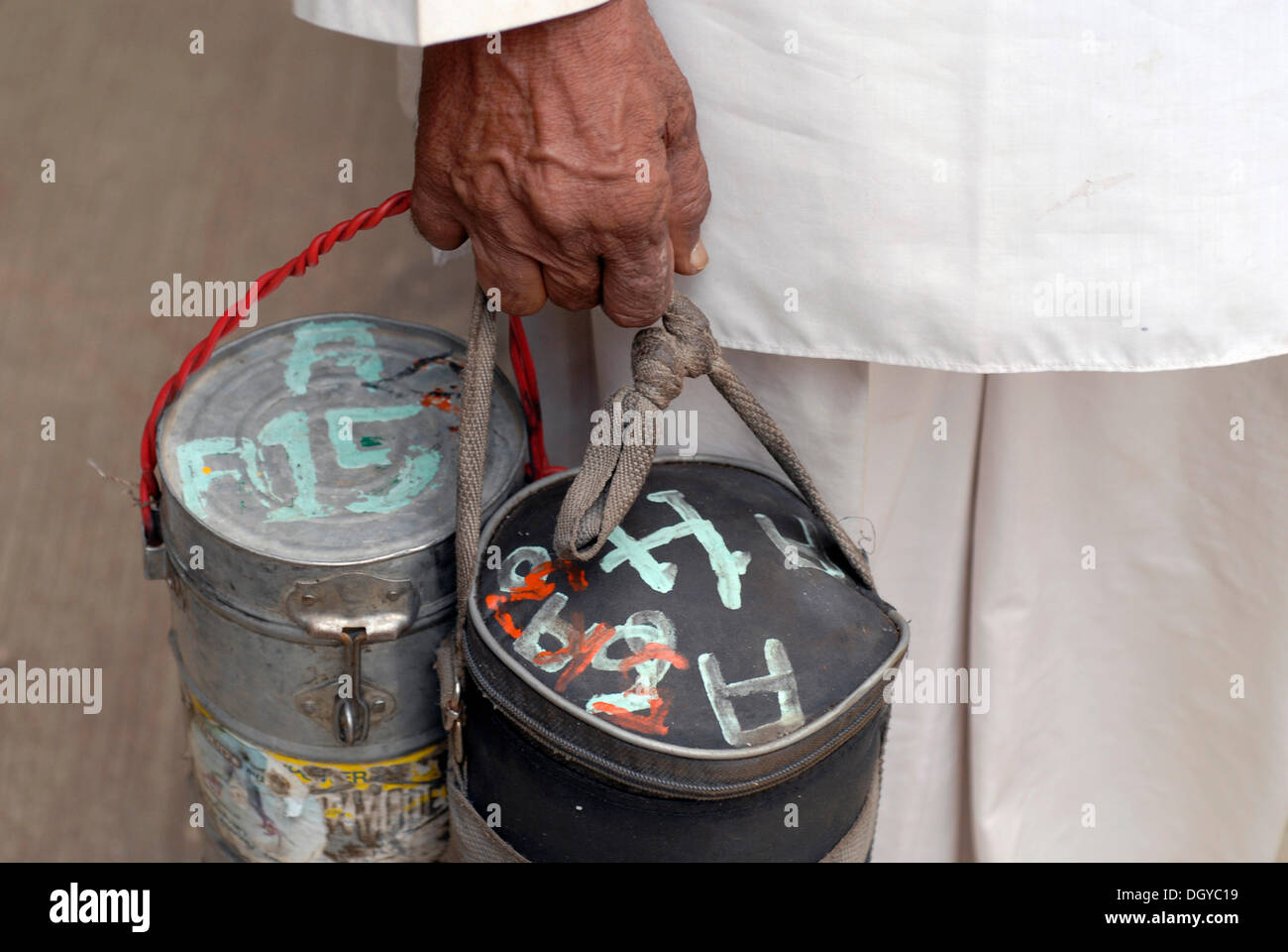 Dabba wallah or food deliverer with Dabbas or food containers marked ...