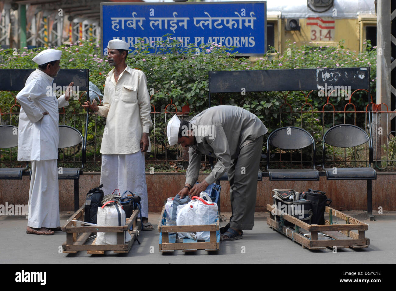 Dabba wallahs or food deliverers with Dabbas or food containers, Mumbai ...