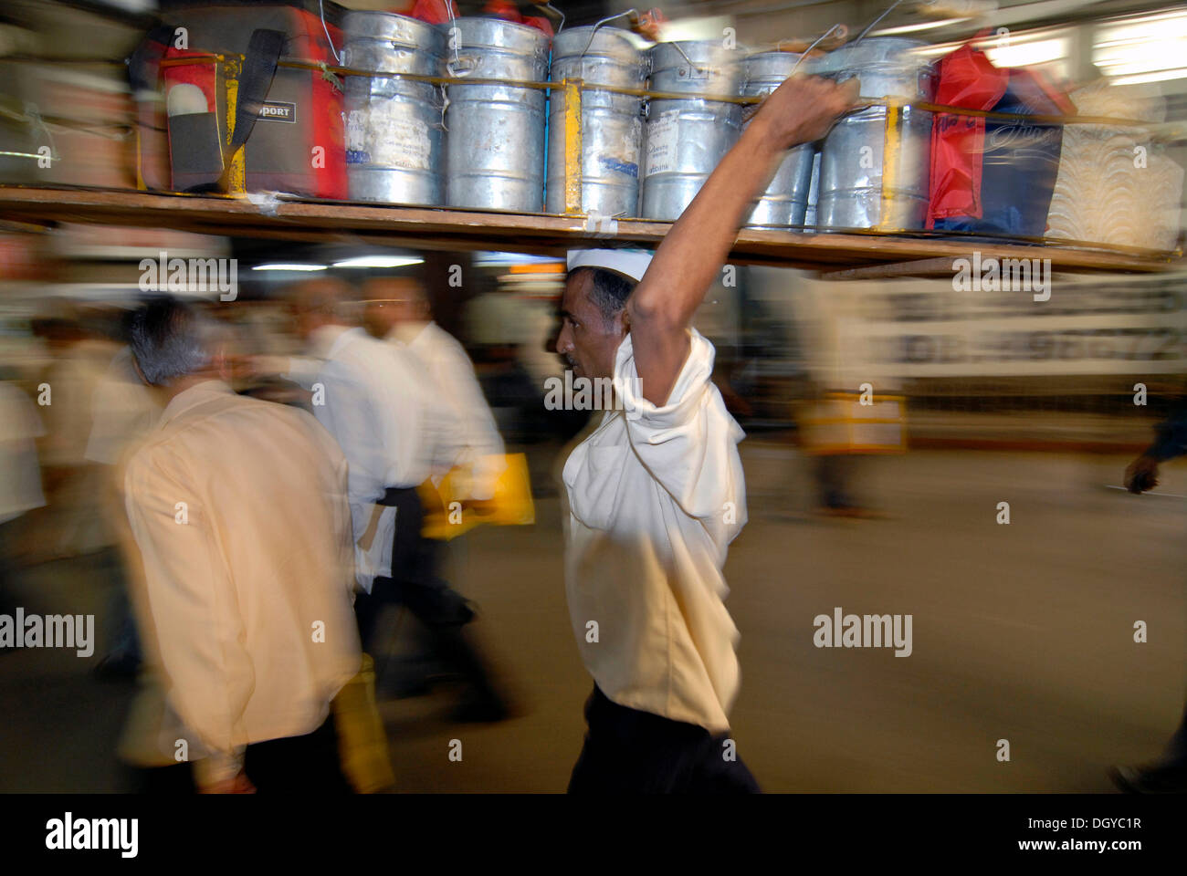 Dabba wallah or food deliverer with a pallet of Dabbas or food ...